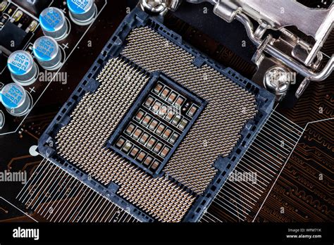 Opened Central Processor Land Grid Array Slot On Pc Mainboard Closeup