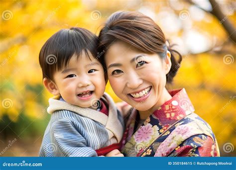 Adorable Japanese Mother And Son Smiling In Autumn Leaves Stock Illustration Illustration Of