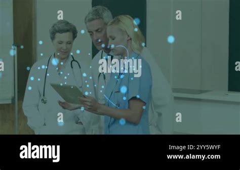 Reviewing Patient Information On Tablet Doctors With Cybersecurity