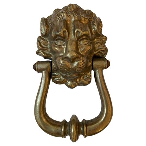 Vintage Patinated Solid Cast Brass Lions Head Door Knocker For Sale At