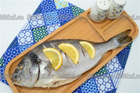 Дорадо в фольге с лимоном в духовке 8 фото в рецепте