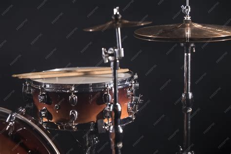 Free Photo Close Up Drum Set In A Dark Room Against The Backdrop Of