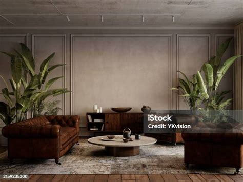 몰딩 갈색 가죽 소파 안락의자 서랍장 커피 테이블 열대 식물 및 장식이 있는 회색 로프트 인테리어 3d 렌더링 일러스트레이션 모형 0명에 대한 스톡 사진 및 기타 이미지