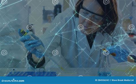 Animation Of Network Of Connections Over Caucasian Female Scientist In
