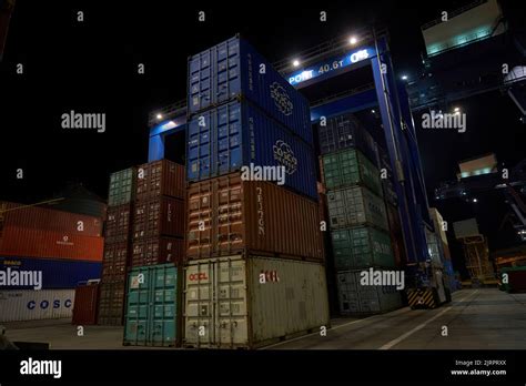 operation of container terminal at night unloading container ship at