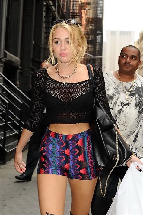 Miley Cyrus Busty Wearing See Thru Belly Top And Shorts While Buying Boots In Ny Porn Pictures