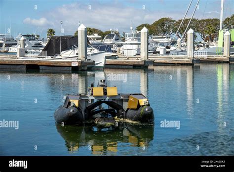 A Robot Floating Trash Collector Sails In Huntington Beach CA