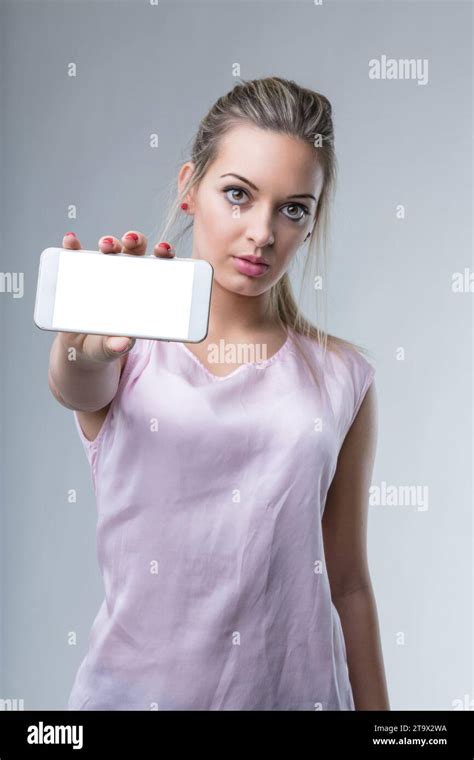 Casual Yet Tech Focused The Woman Displays A Screen For Customization