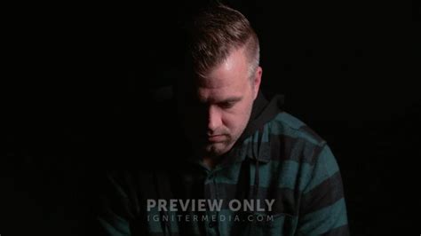 A Man Alone In A Dark Room Looking Down Stock Videos The Visual Folk