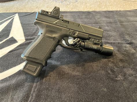 Is the PSA DAGGER COMPLETE RMR SLIDE ASSEMBLY WITH NON-THREADED BARREL & HOLOSUN HS507C X2 ...