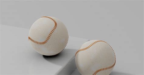 하얀 표면 위에 앉아 있는 두 개의 야구공 사진 Unsplash의 야구 이미지