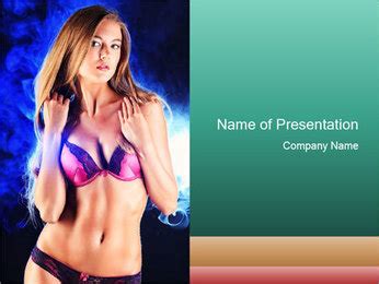 Sensual Lingerie Portrait Of A Woman Against Dark Background Illuminated With Blue Light