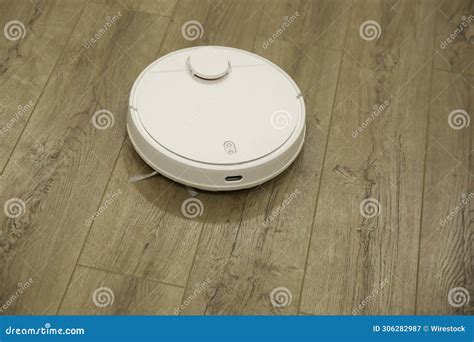 Automated Robotic Vacuum Cleaner On The Floor Of A Residential Space Stock Image Image Of