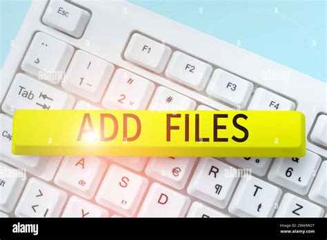 Hand Writing Sign Add Files Concept Meaning To Put More Information To