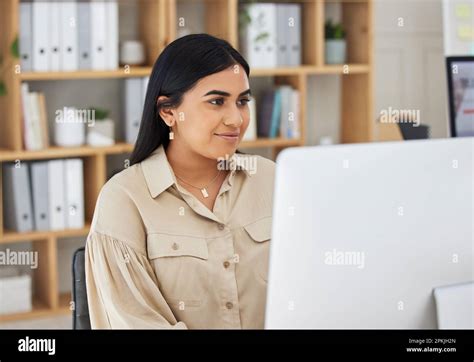 business online or indian woman typing on computer working on email