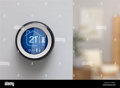 Thermostat Displaying Temperature In Celsius Scale And Different Icons Smart Home Device On