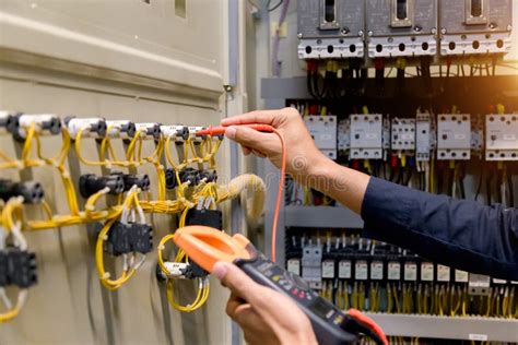 Electrician Engineer Work Tester Measuring Voltage And Current Of Power