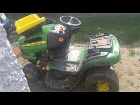 How to Adjust Seat on John Deere LA100 Riding Lawnmower - YouTube