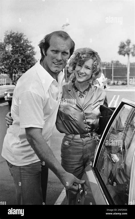 Pittsburgh Steelers Quarterback Terry Bradshaw Embraces His Wife Jojo