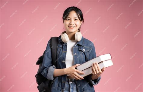 Premium Photo Asian Girl Student Posing On Pink Background