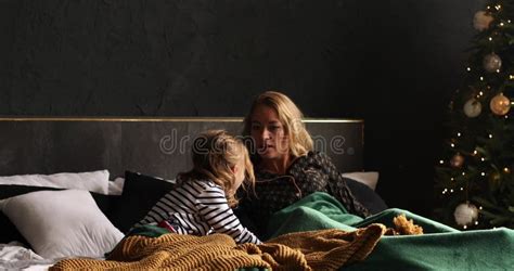 Mom And Daughter Wake Up In The Morning On New Year And Christmas My Daughter Is Happy With The