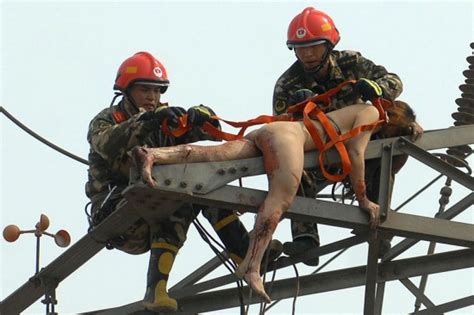 Health Love And Entertainment Naked Chinese Woman Climbs High Voltage Electricity Tower