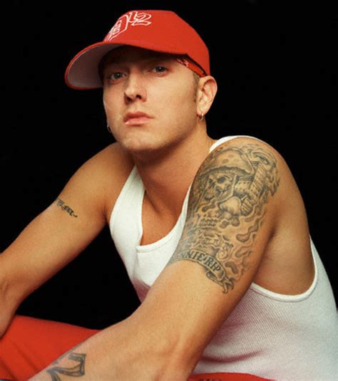 Eminem Arm Tattoos Meaning Behind The Iconic Ink On Forearms
