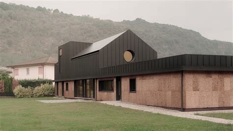 LCA Architetti Nestles Angular Cork Clad Home Into Italian Valley