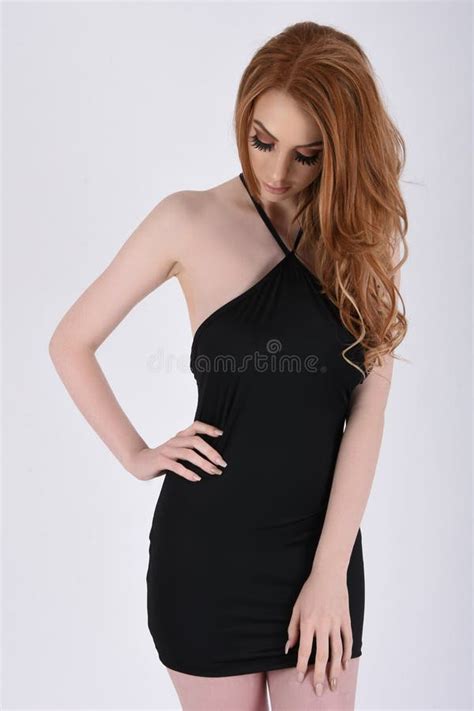 Sexy Busty Redhead In Short Tight Latex Dresses Stock Photo Image Of Grey Girl
