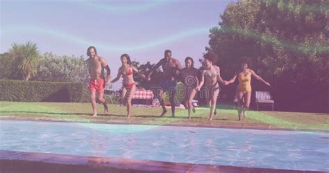 Jumping Into Swimming Pool Group Of Friends In Swimwear Creating Fun