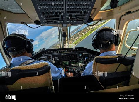 A View Of Two Crew Inside The Flight Deck Of A Bell 430 Dragonfly