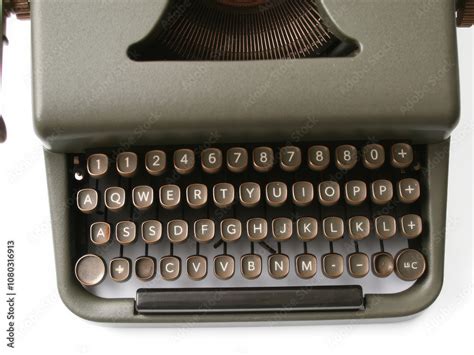 Vintage Typewriter With Classic Qwerty Keyboard Layout Featuring Round