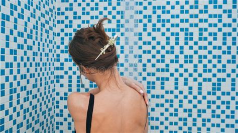 Beautiful Brown Haired Girl Takes A Shower After Swimming In The Pool