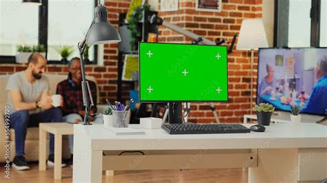 Empty Workspace Table With Greenscreen Display On Computer Used To Work On Freelance In Living