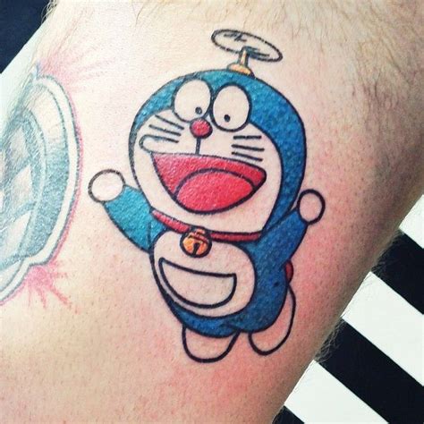 10 Nostalgic Tattoos Of Doraemon The Wishgranting Anim Cat Tattoo World