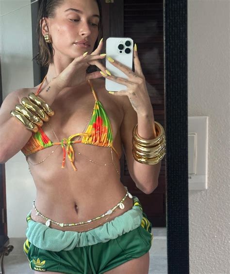 Hailey Bieber Shows Off New Lip Gloss In A Colorful Bikini