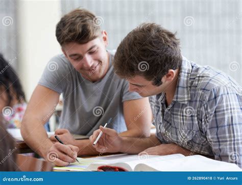 Comparing Their Assignment Notes A University Students Studying In