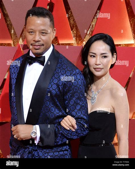 Actor Terrence Howard L And Mira Pak Arrive On The Red Carpet For The