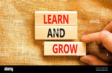 Learn And Grow Symbol Concept Word Learn And Grow On Beautiful Wooden