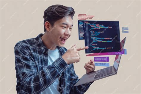 Excited Young Asian Programmer Laptop Coding Screen Youthful Engagement