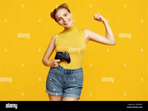 Portrait Of Gorgeous Happy Blonde Gamer Girl Playing Video Games Using