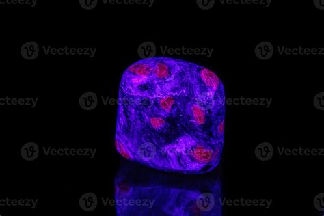 Macro Mineral Stone Ruby Under Ultraviolet Light On A Black Background 38121233 Stock Photo At