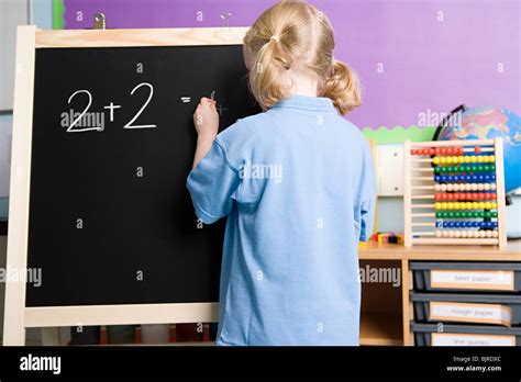 Girl Solving Sums Stock Photo Alamy