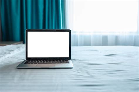 Premium Photo Mock Up Blank Screen Laptop On The Bed For Advertising And Text