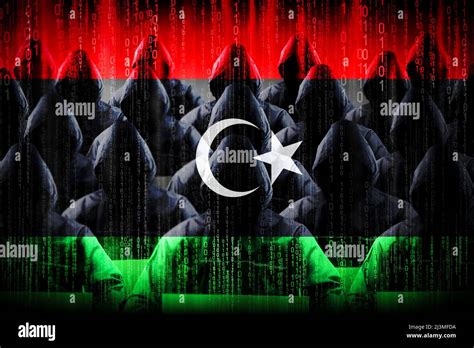 anonymous hooded hackers flag of libya binary code cyber attack