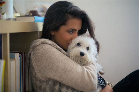 Girl Kissing Her Dog By Stocksy Contributor Lumina Stocksy