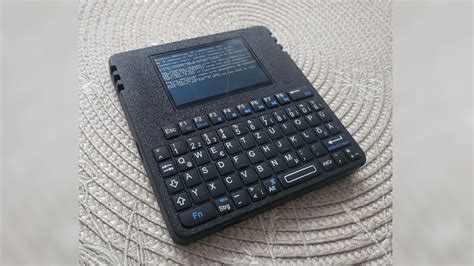 Cyberdore 2064 Cyberdeck Features An Oversized Scroll Wheel Handle Oled Display And Raspberry