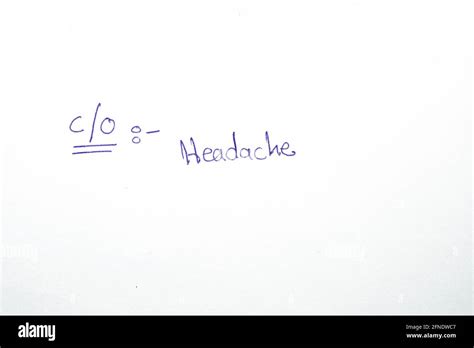 The Word Headache That Is Handwritten By A Physician On A Hospital