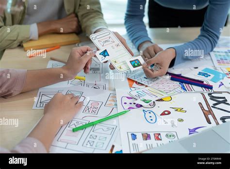 Team Of Ux Developer And Ui Designer Brainstorming Interface Wireframe Design Creative Digital