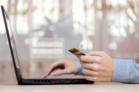 Premium Photo A Businessman Is Typing A Login And Password On The